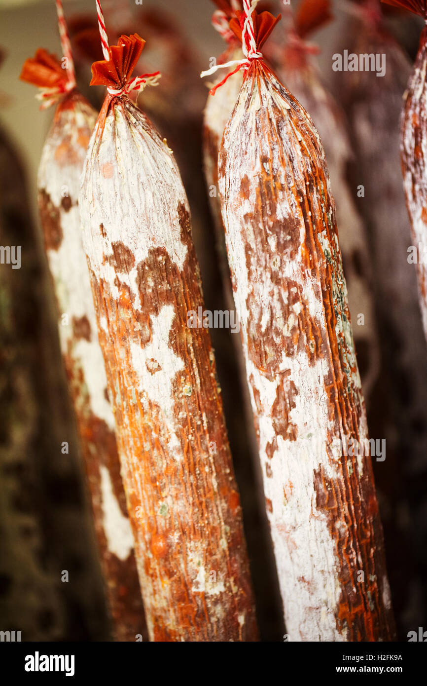 Hanging from hooks hi-res stock photography and images - Alamy