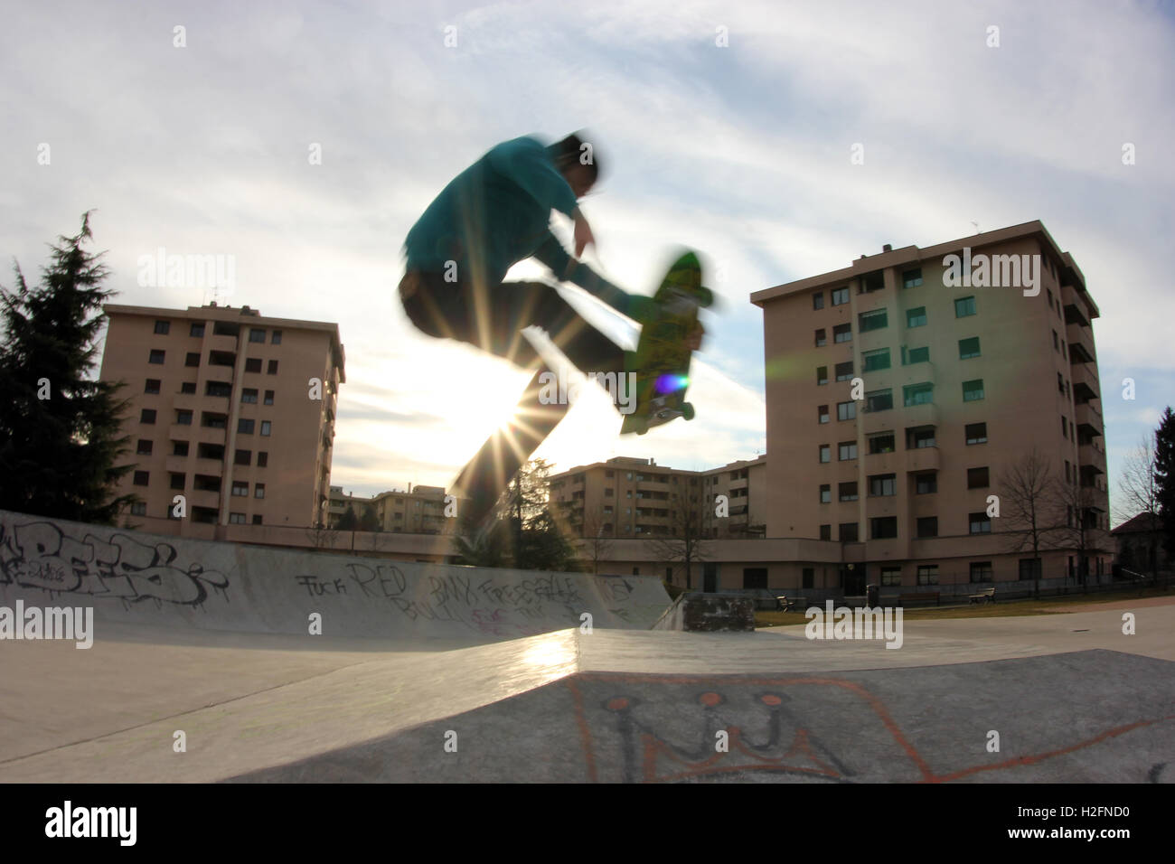 skateboarder performing a huge frontside boneless on the pyramid of the ...