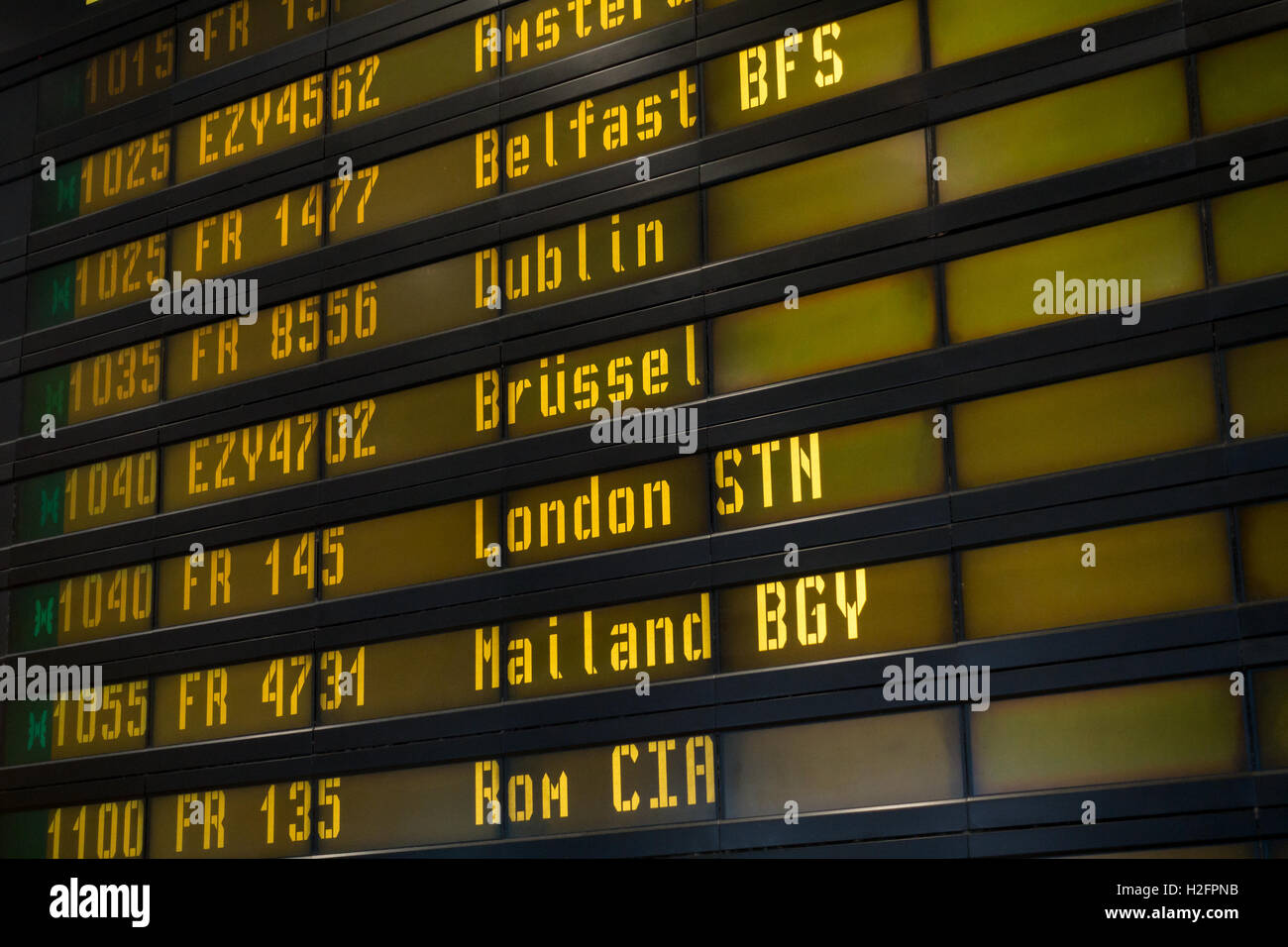 Timetable digital board at an airport Stock Photo - Alamy