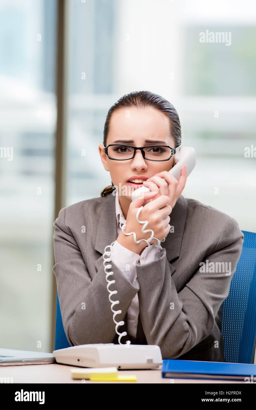 Call center operator working at her desk Stock Photo - Alamy