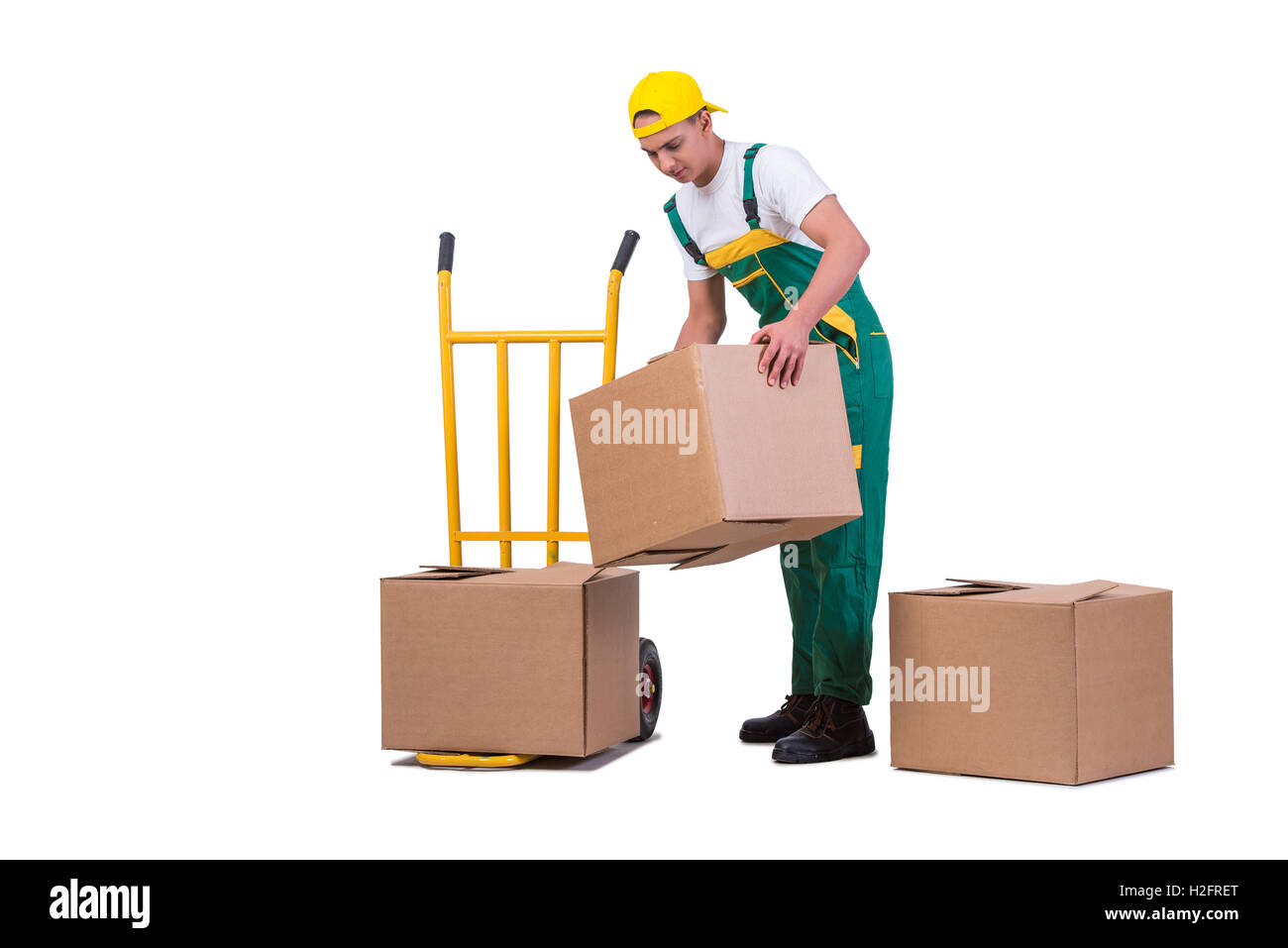 Young man moving boxes with cart isolated on white Stock Photo - Alamy