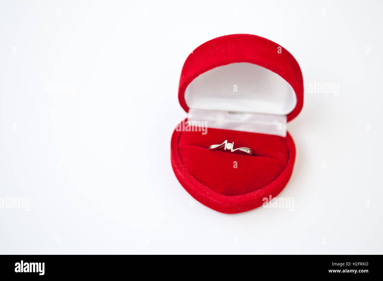 Beautiful engagement ring in red box Stock Photo - Alamy