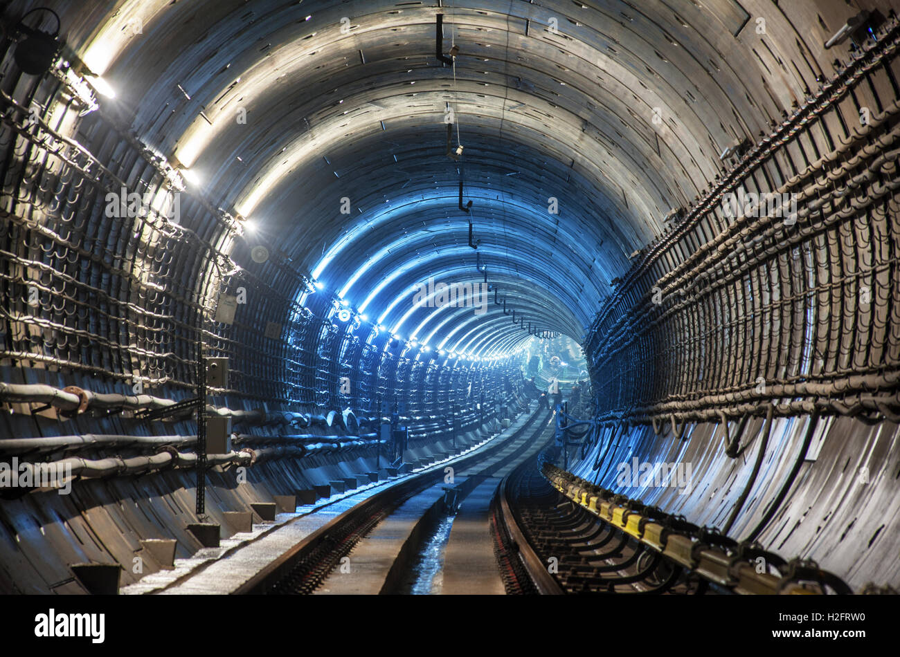 New subway tunnel with blue light Stock Photo - Alamy