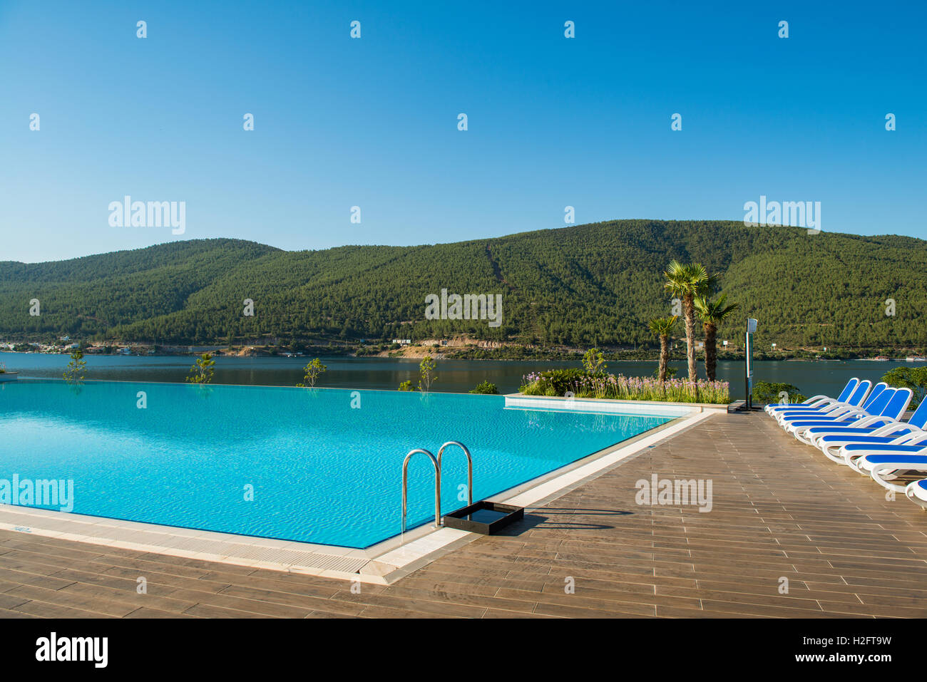 Nice swimming pool outdoors on bright summer day Stock Photo - Alamy