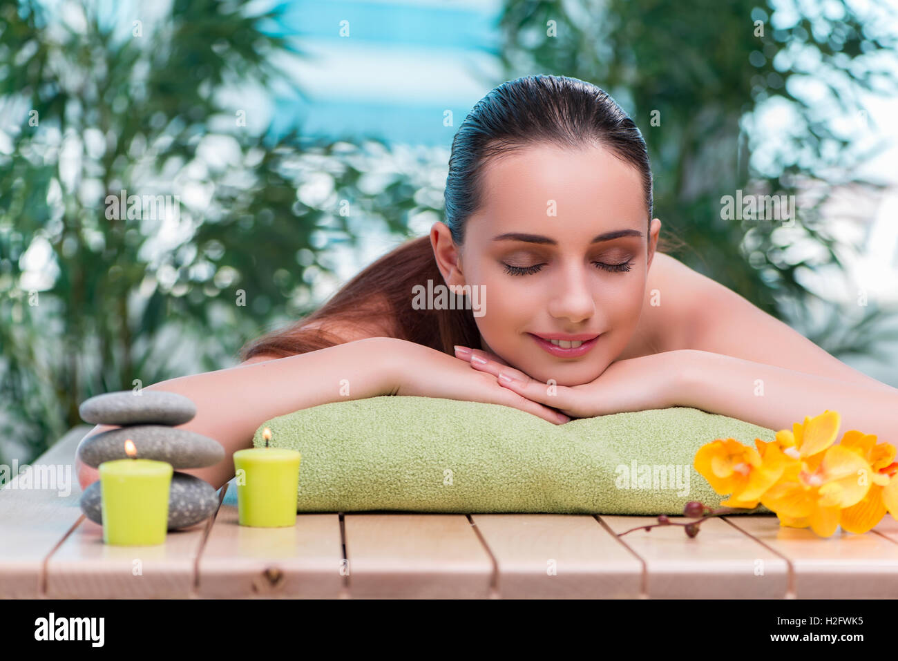 Young beautiful woman during spa procedure Stock Photo - Alamy