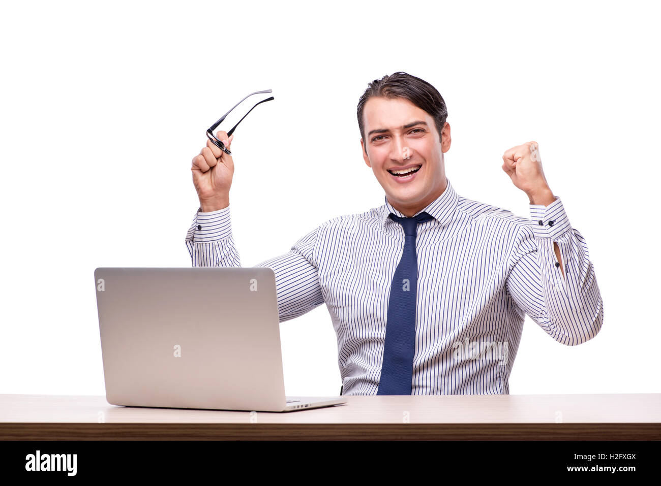 Handsome businessman working with laptop computer isolated on white ...