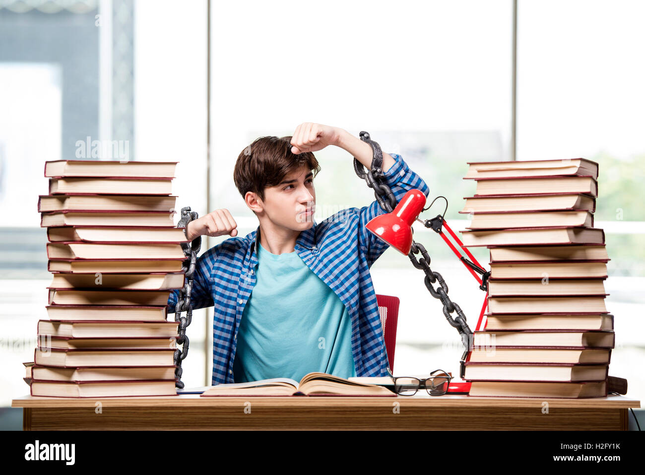 Young man preparing for graduation exams in college Stock Photo - Alamy