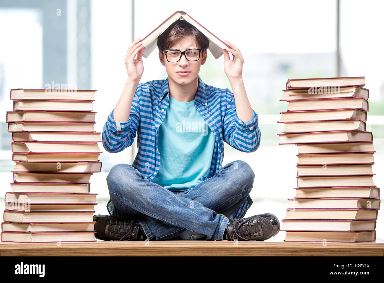 Young man student preparing for college exams Stock Photo - Alamy