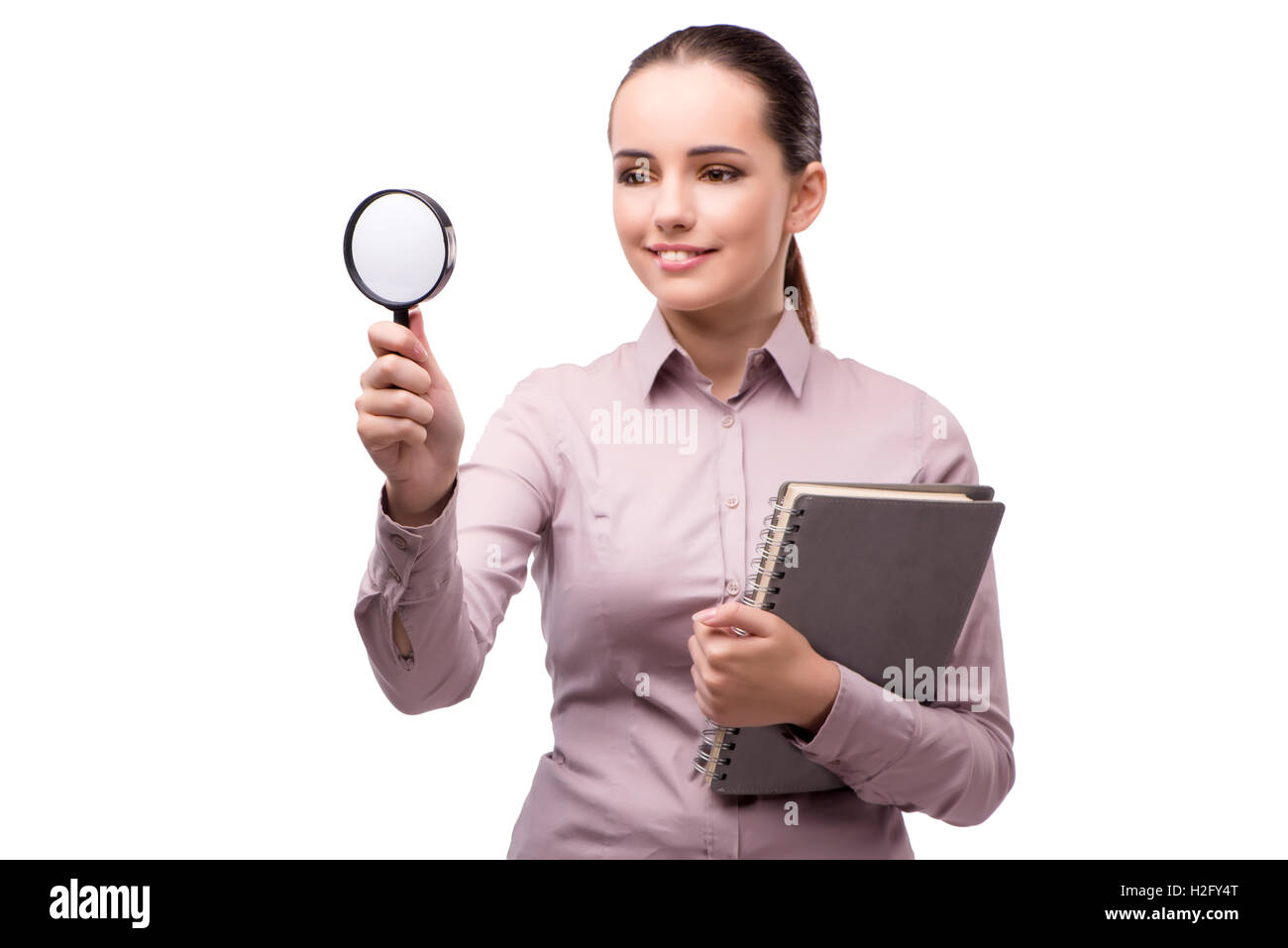 Young student with magnifying glass isolated on white Stock Photo - Alamy