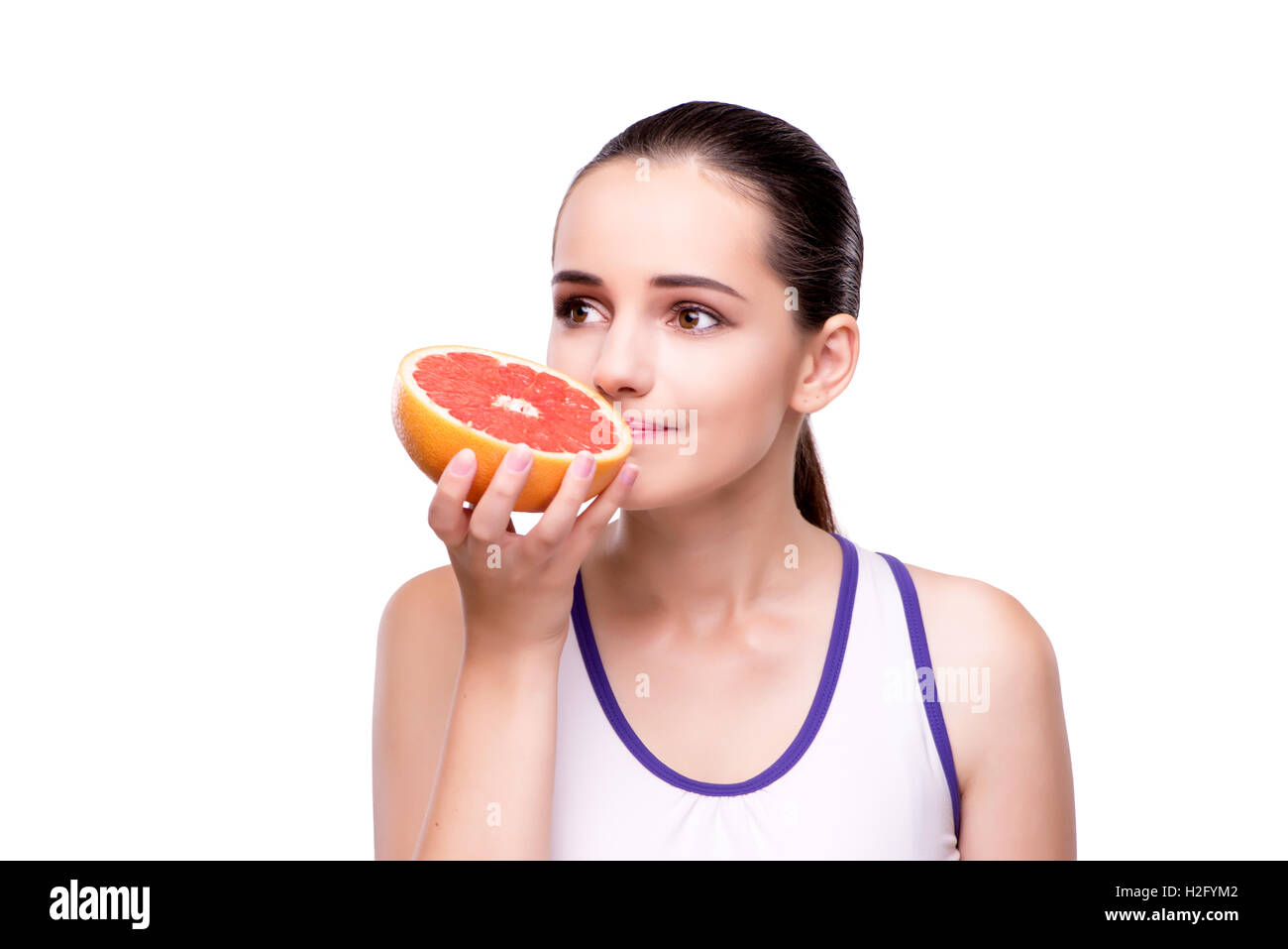 Woman with grapefruit isolated on white Stock Photo - Alamy