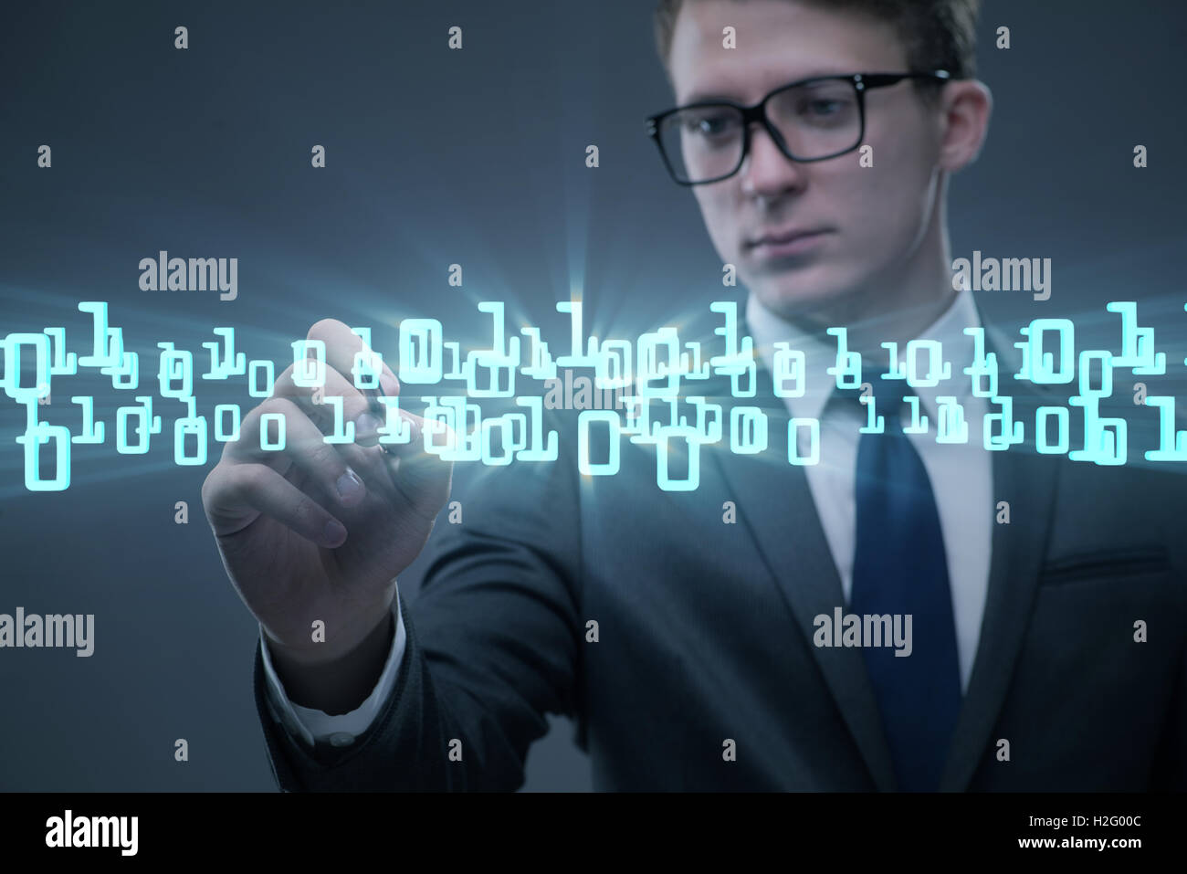 Businessman pressing binary buttons in tech concept Stock Photo - Alamy