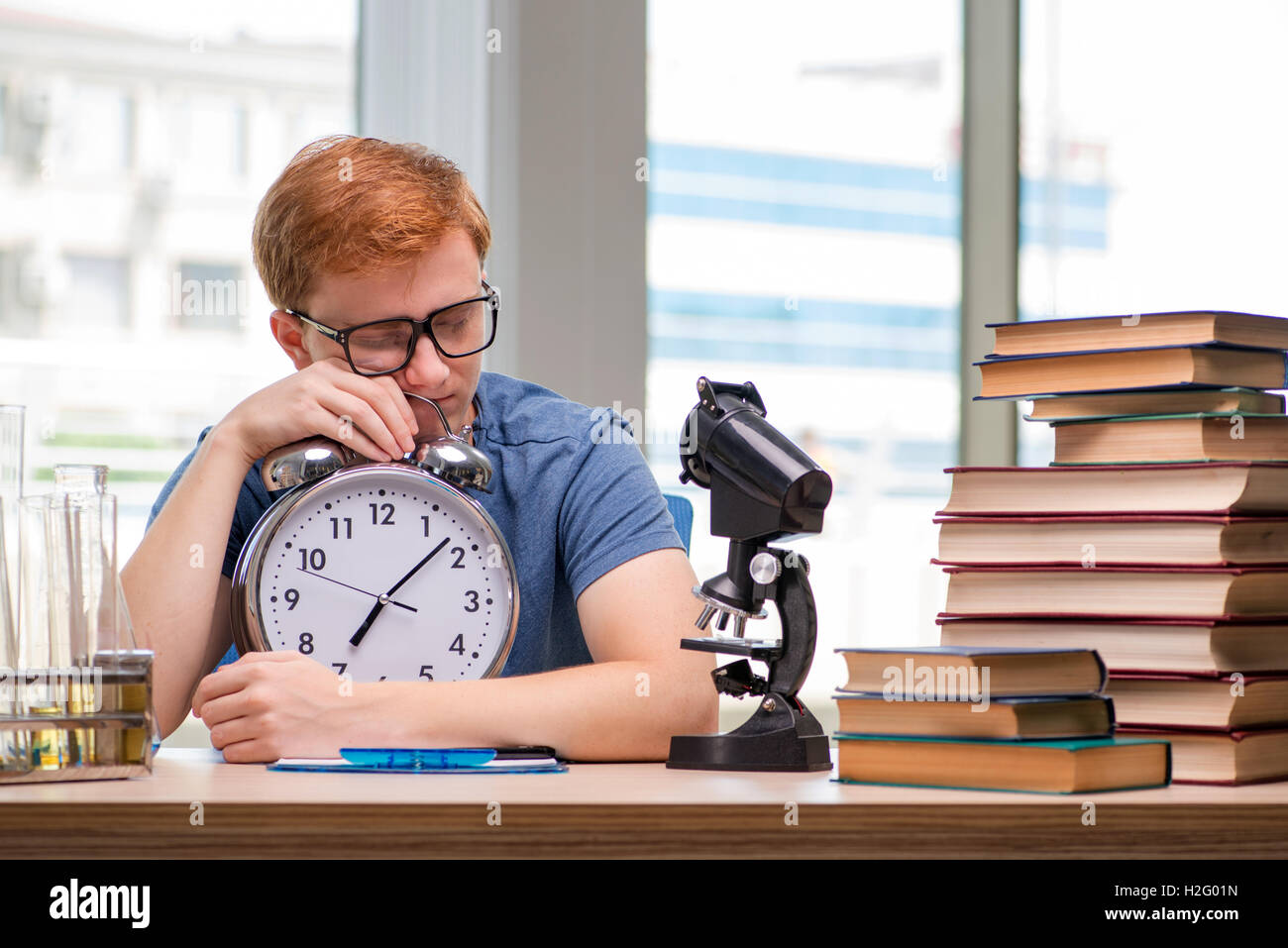 Young student preparing for chemistry exam Stock Photo - Alamy