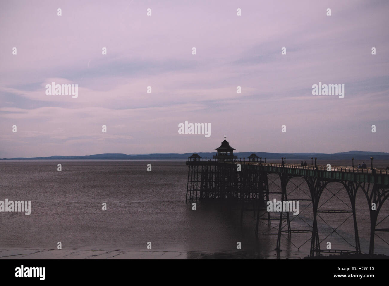 View of the seafront at Clevedon, England. Including the pier. Vintage ...