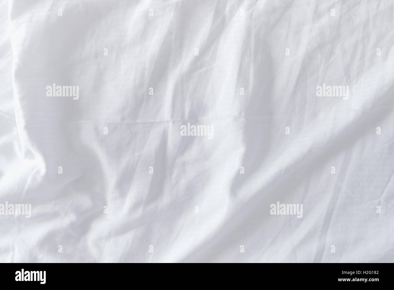 Messy bedding sheet after sleep, top view background Stock Photo - Alamy