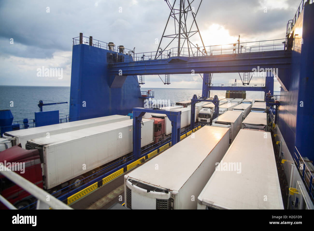 Color image of some trucks loaded on the deck of a ferry boat Stock ...