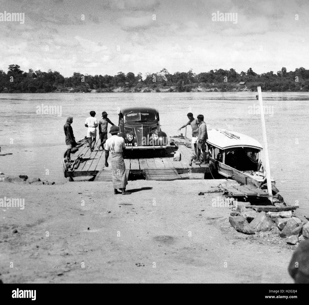 Primitive Car Ferry On River In Burma 1930 Stock Photo - Alamy
