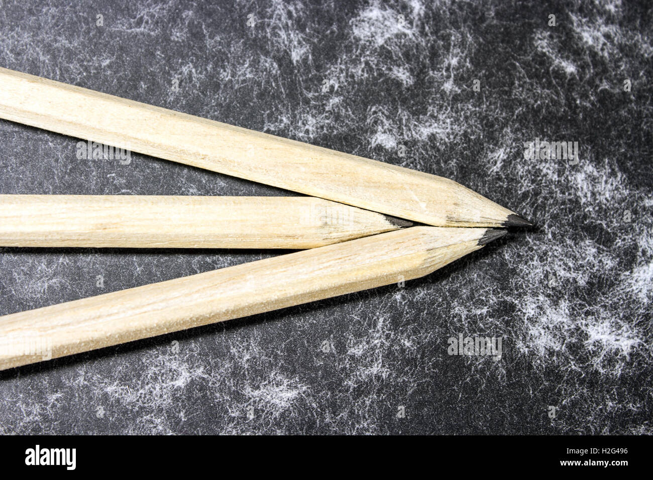 Writing Pencils arranged at angles against a marbled background Stock ...