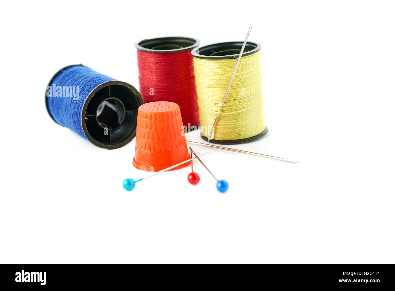 Spools of threads isolated over the white background Stock Photo - Alamy
