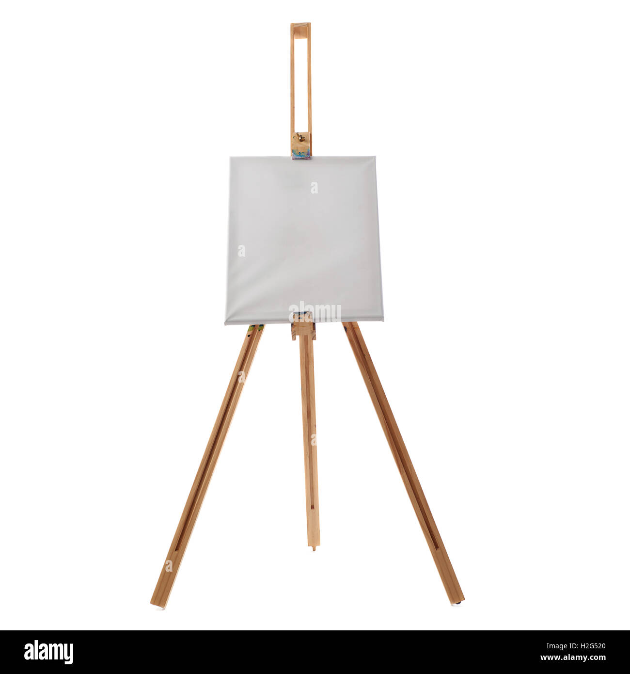 Wooden easel over isolated white background Stock Photo - Alamy