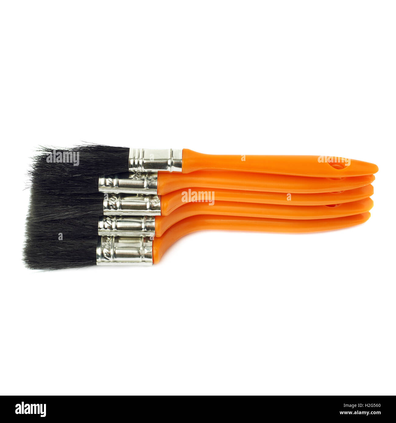 Pile of Paint brushes over isolated white background Stock Photo - Alamy