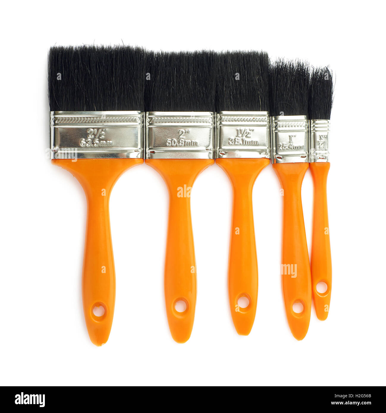Pile of Paint brushes over isolated white background Stock Photo - Alamy