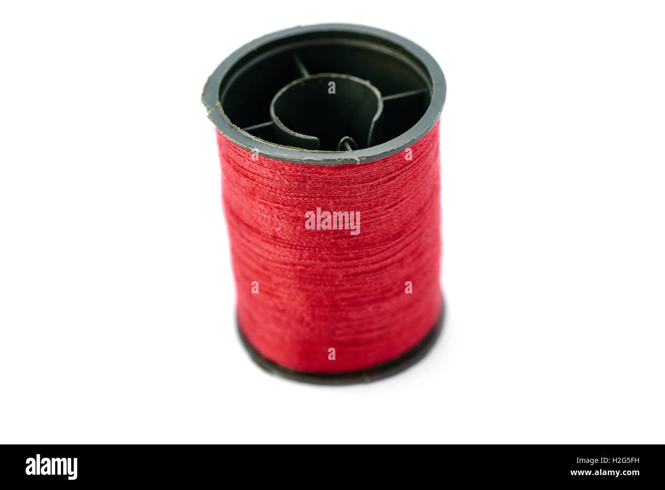 Spool of thread isolated over the white background Stock Photo - Alamy