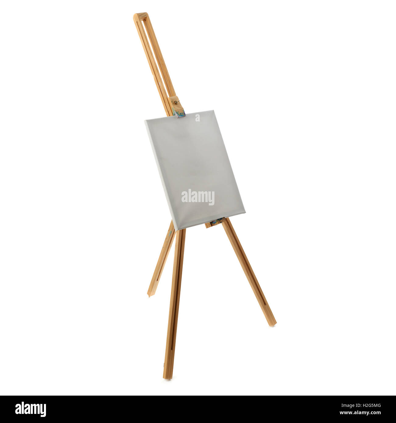 Wooden easel over isolated white background Stock Photo - Alamy