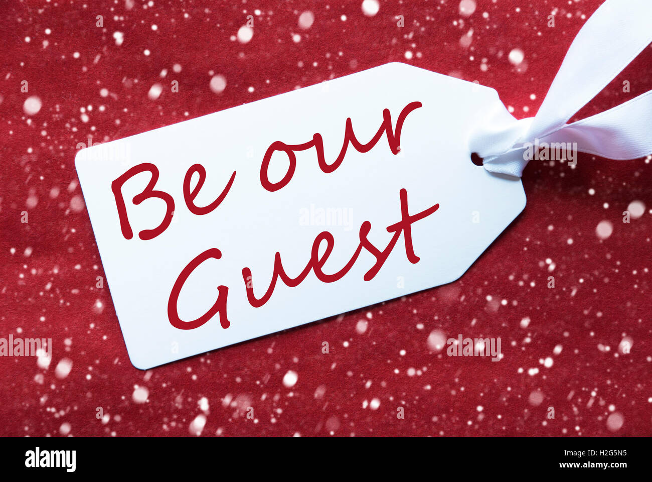 One Label On Red Background, Snowflakes, Text Be Our Guest Stock Photo ...