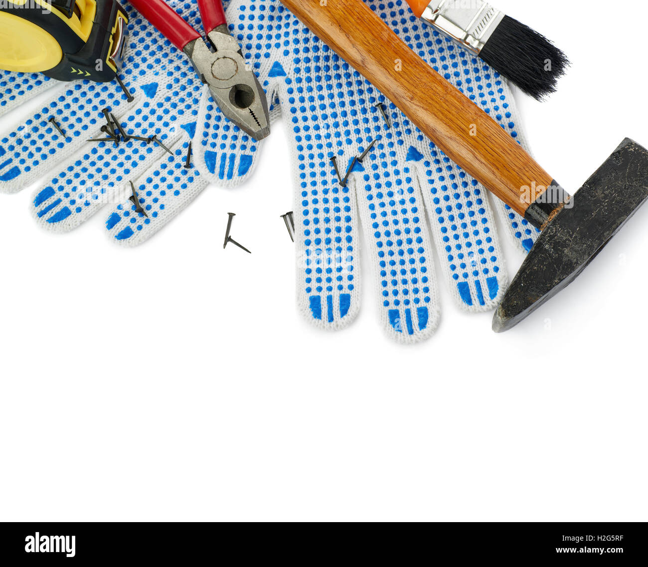 Pile of working tools over isolated white background Stock Photo - Alamy