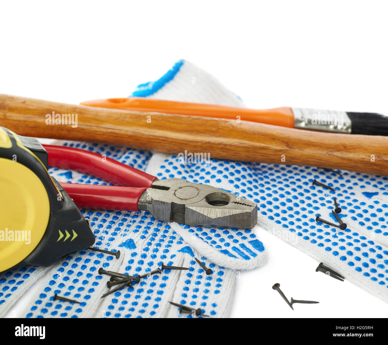 Pile of working tools over isolated white background Stock Photo - Alamy
