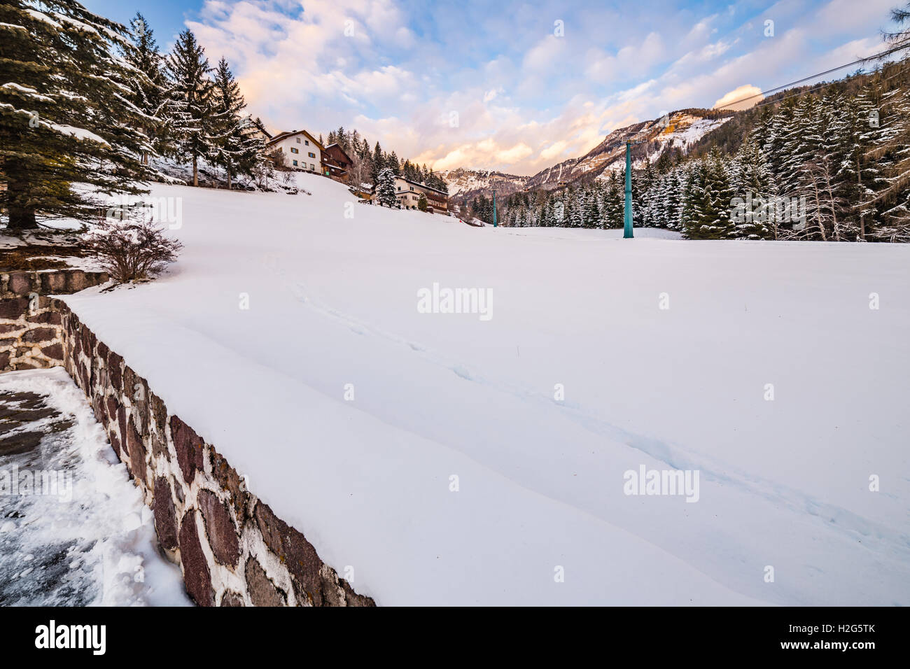 mountain trail in the snow under the cable cars Stock Photo - Alamy