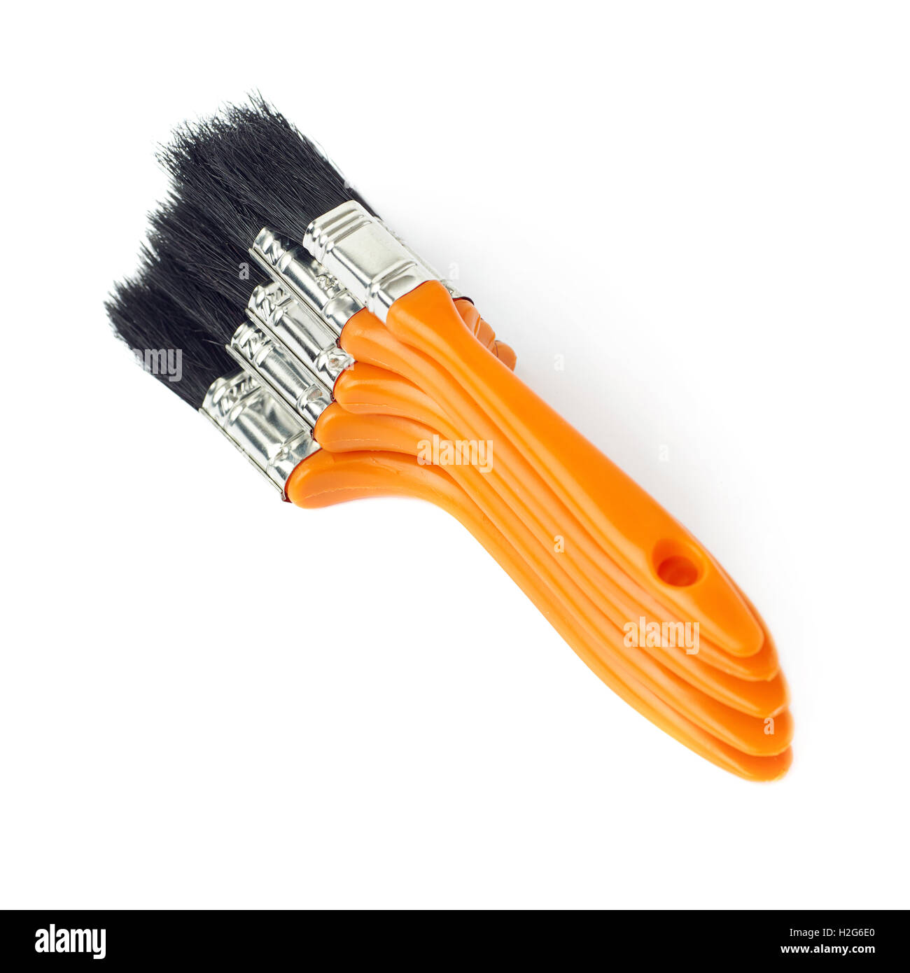 Pile of Paint brushes over isolated white background Stock Photo - Alamy