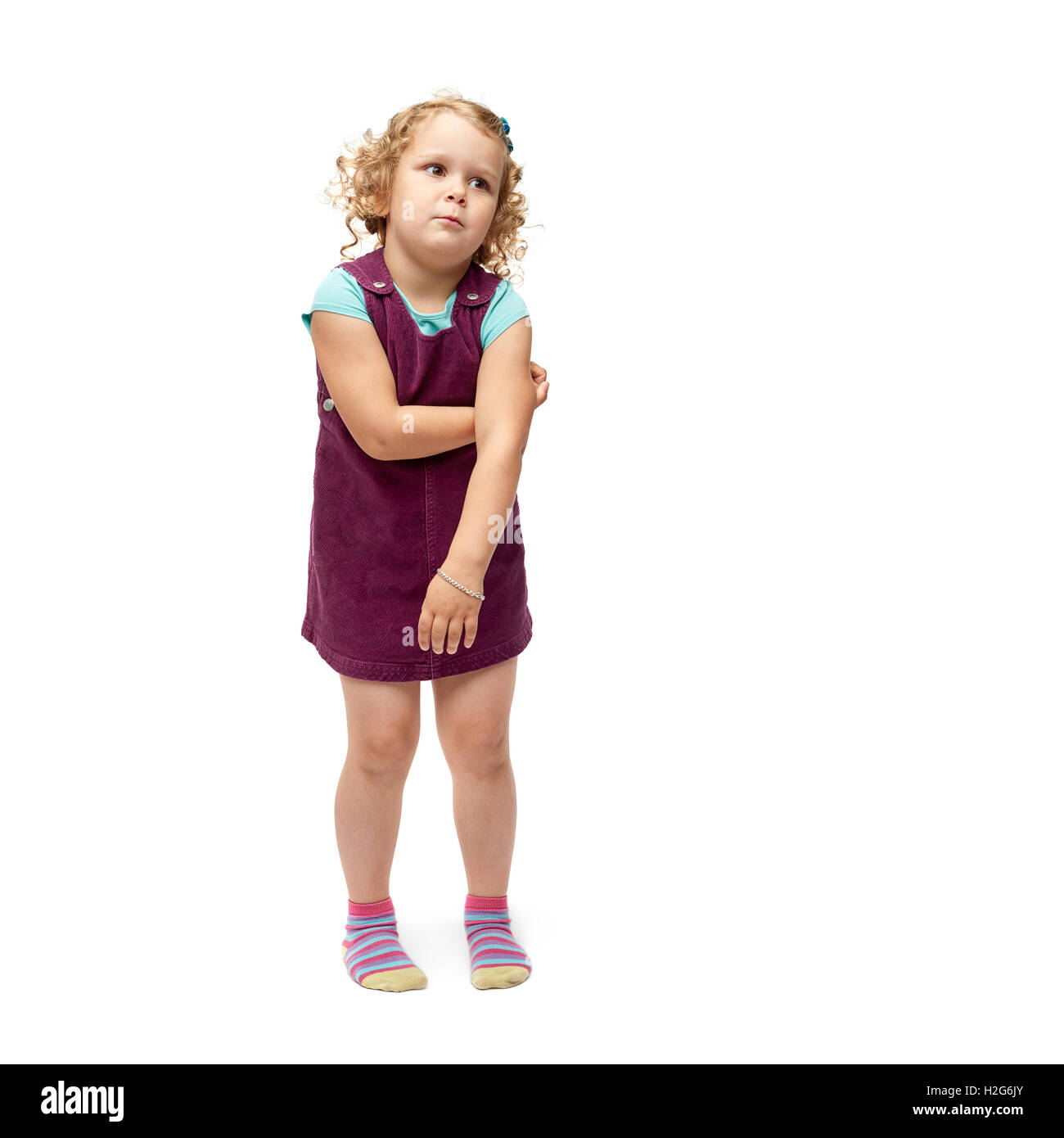 Young little girl standing over isolated white background Stock Photo ...