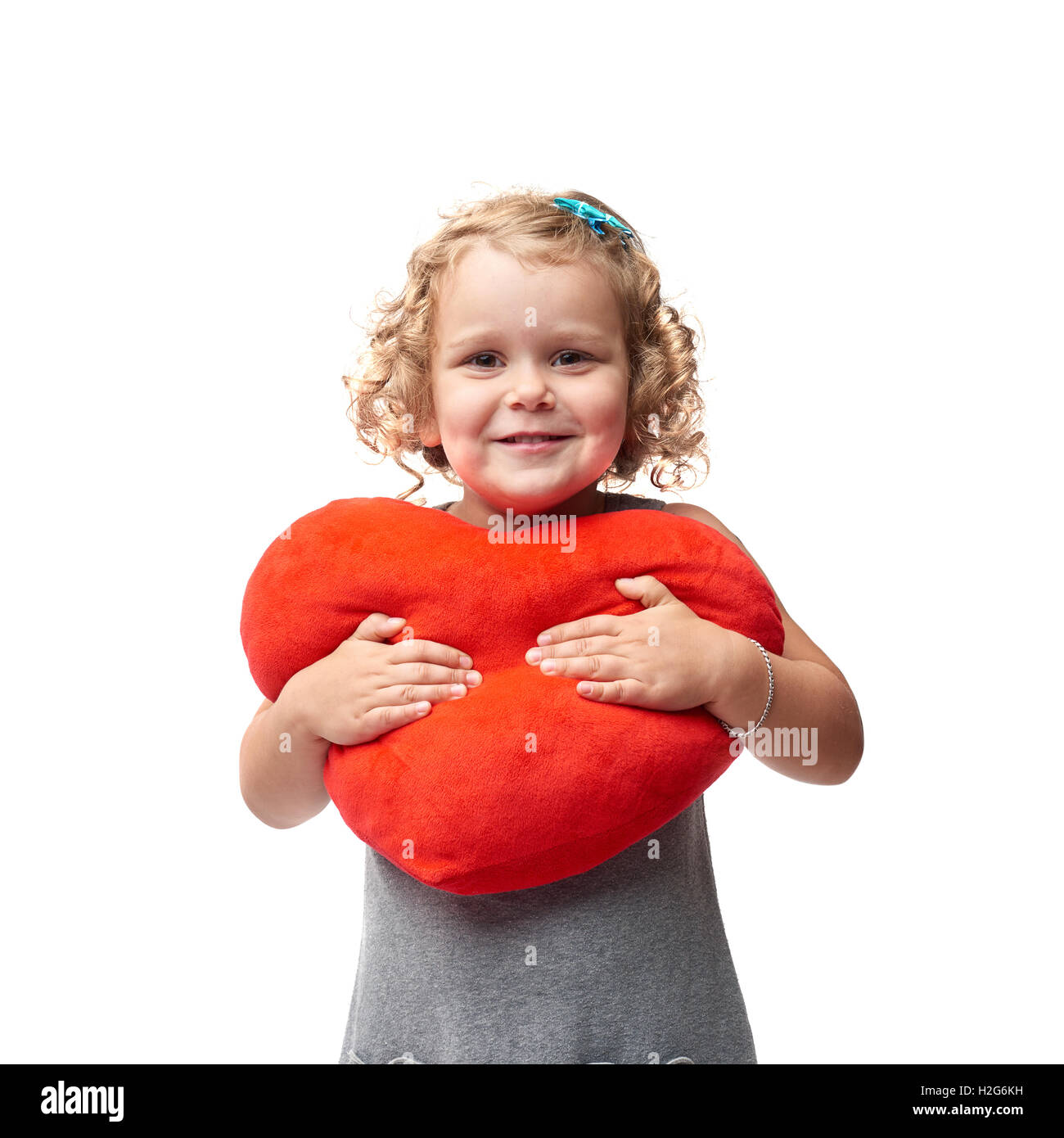 Young little girl standing over isolated white background Stock Photo ...