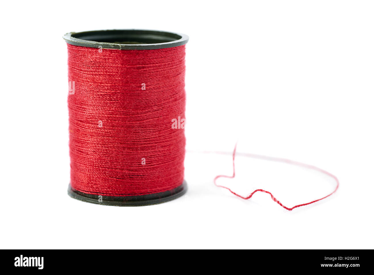 Spool of thread isolated over the white background Stock Photo - Alamy