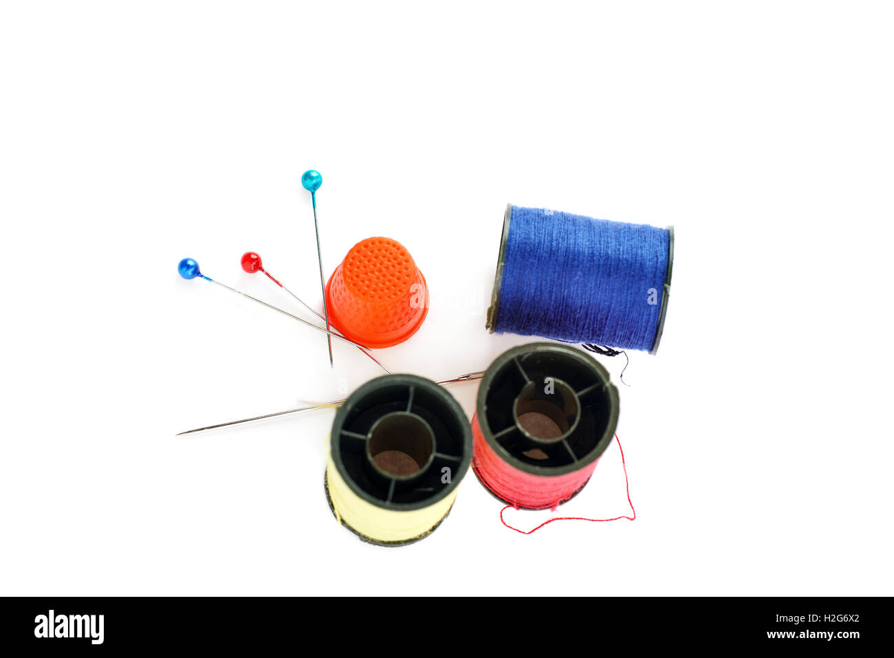 Spools of threads isolated over the white background Stock Photo - Alamy