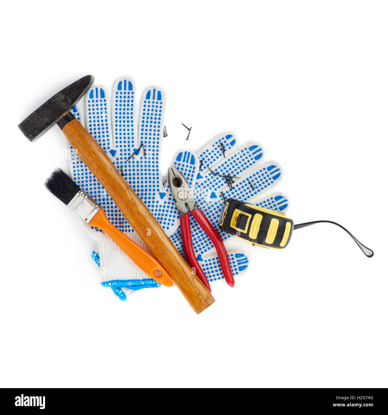 Pile of working tools over isolated white background Stock Photo - Alamy