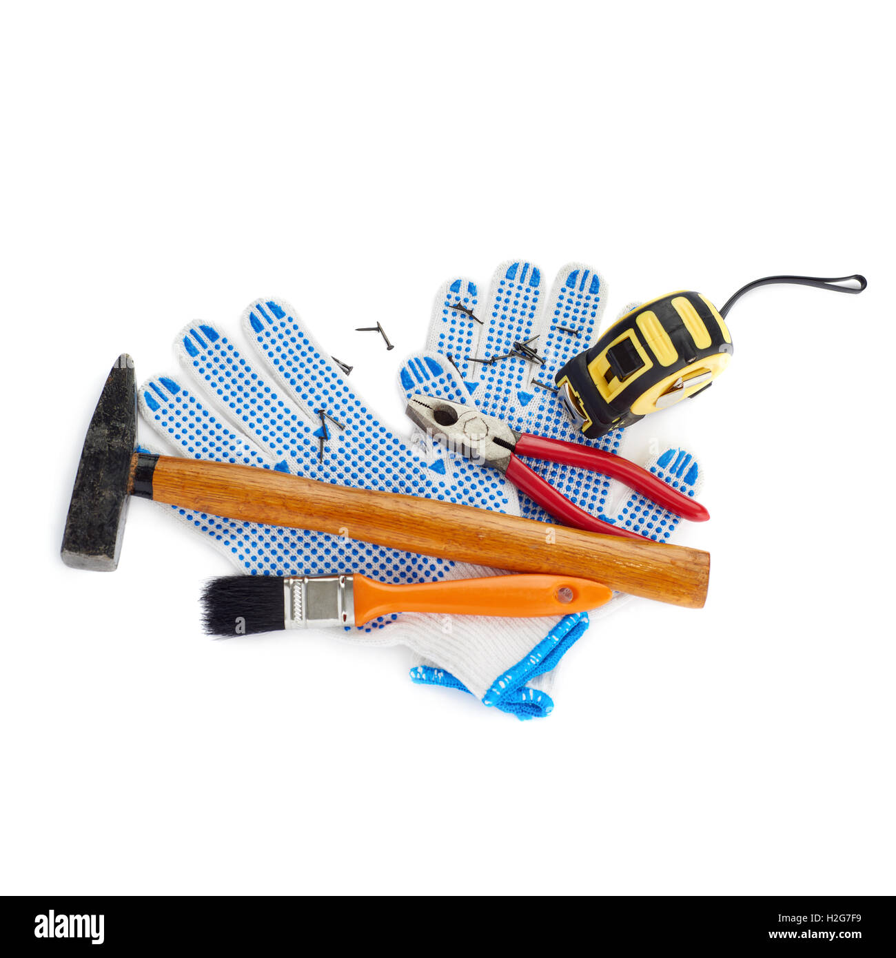 Pile of working tools over isolated white background Stock Photo - Alamy