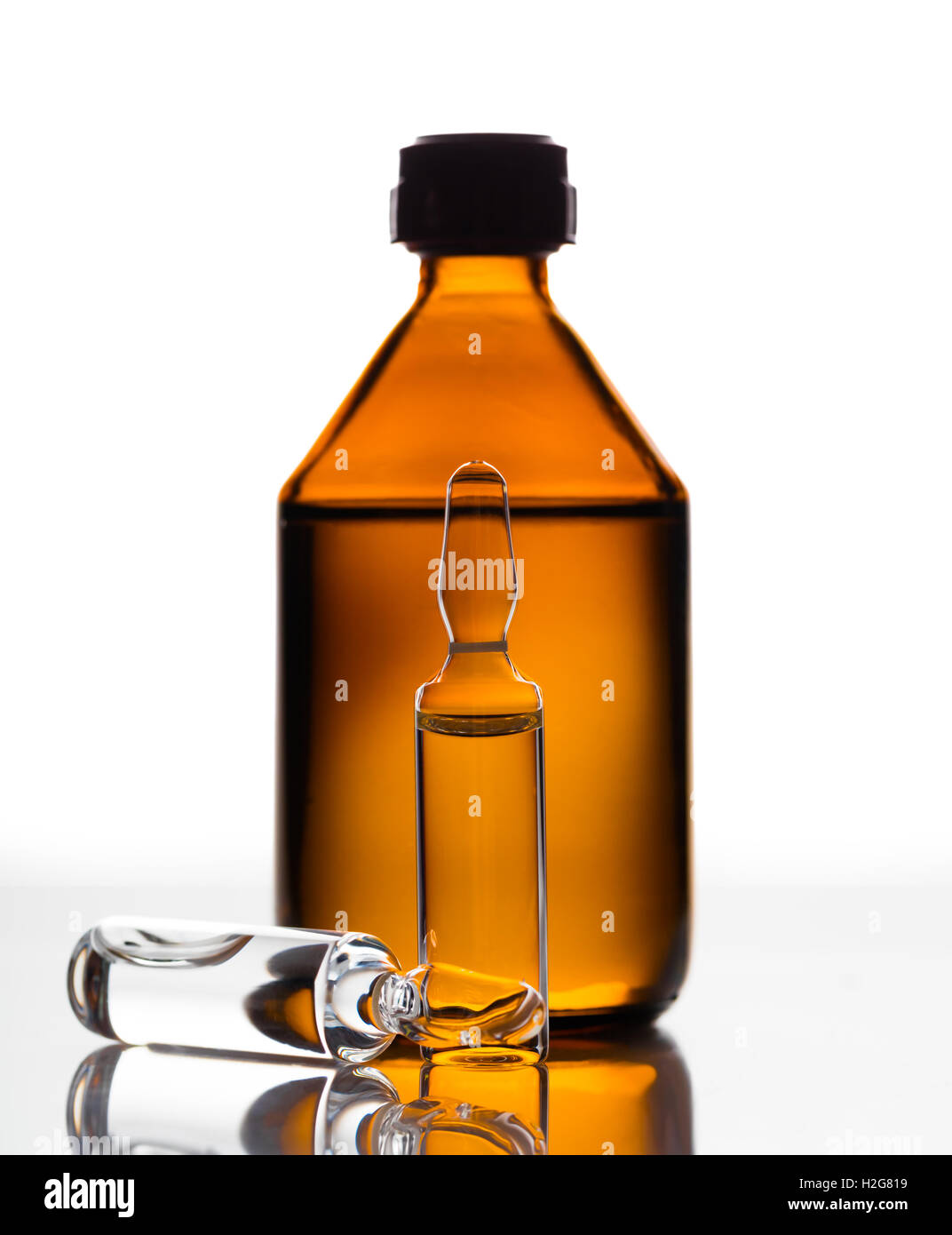 medicament in a glass vial on white background Stock Photo - Alamy