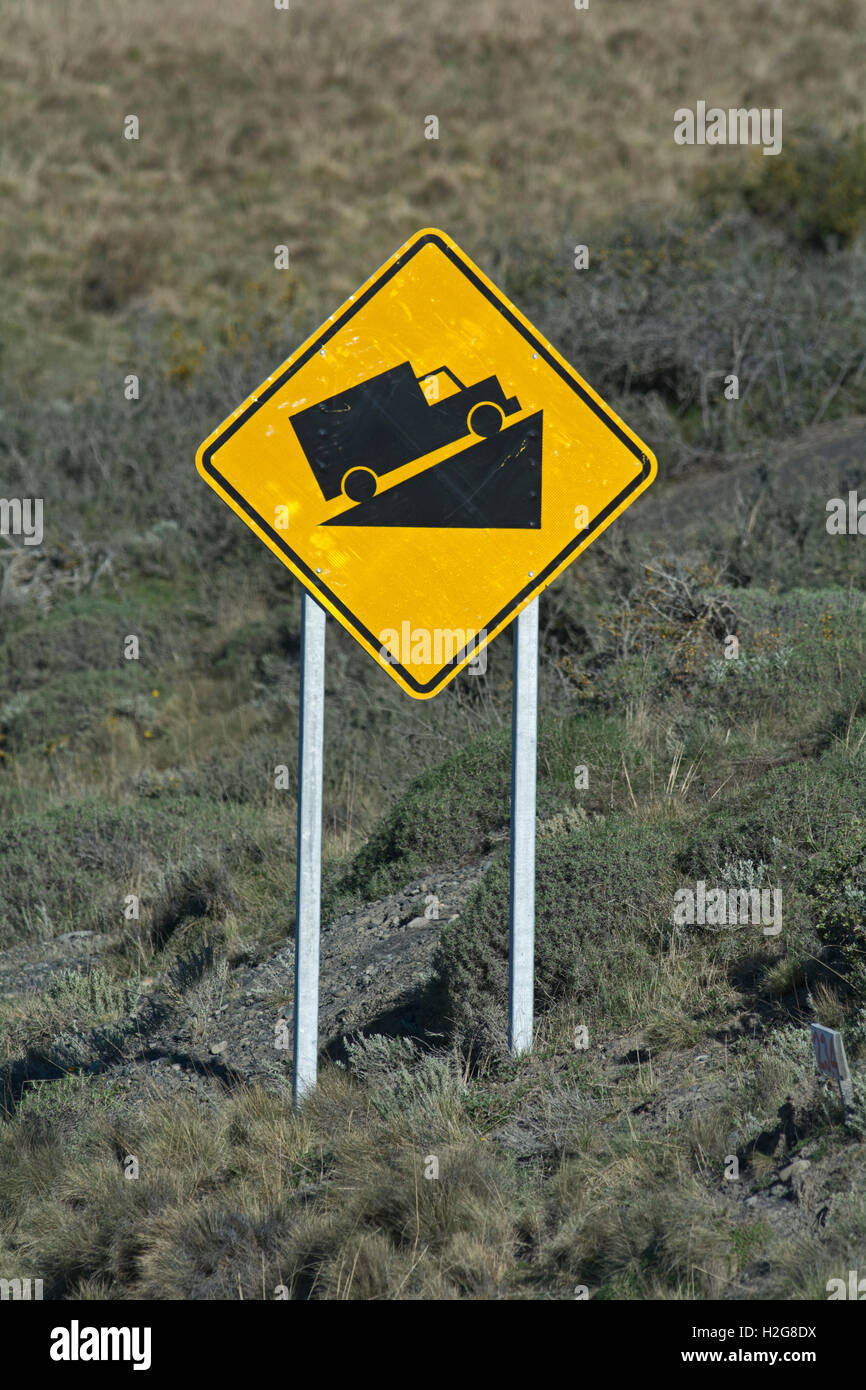 Road sign sign patagonia chile warning steep incline slope hi-res stock ...