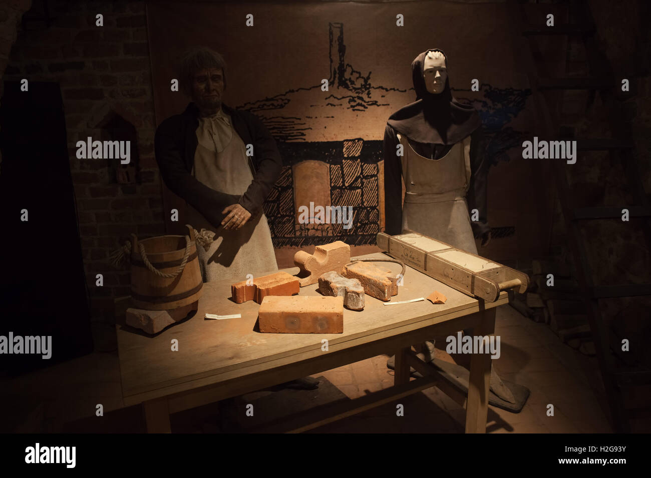 Brickmakers with bricks of different shapes and form, exhibition in ...