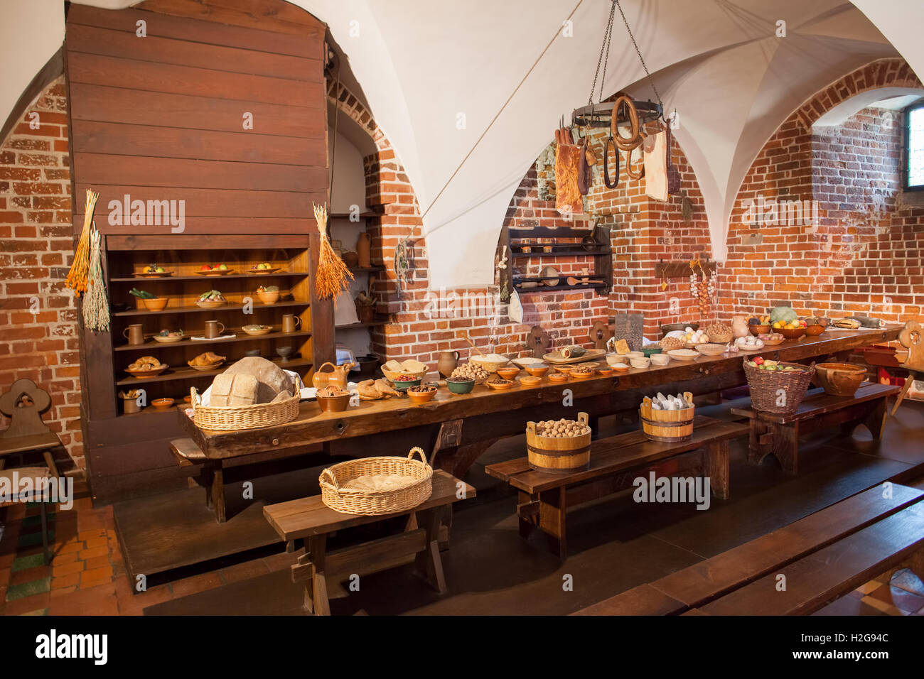 Poland, Malbork Castle interior, feast at medieval Convent Kitchen in ...