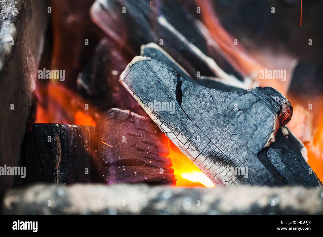 burning wooden coals in the forge furnace close up Stock Photo - Alamy