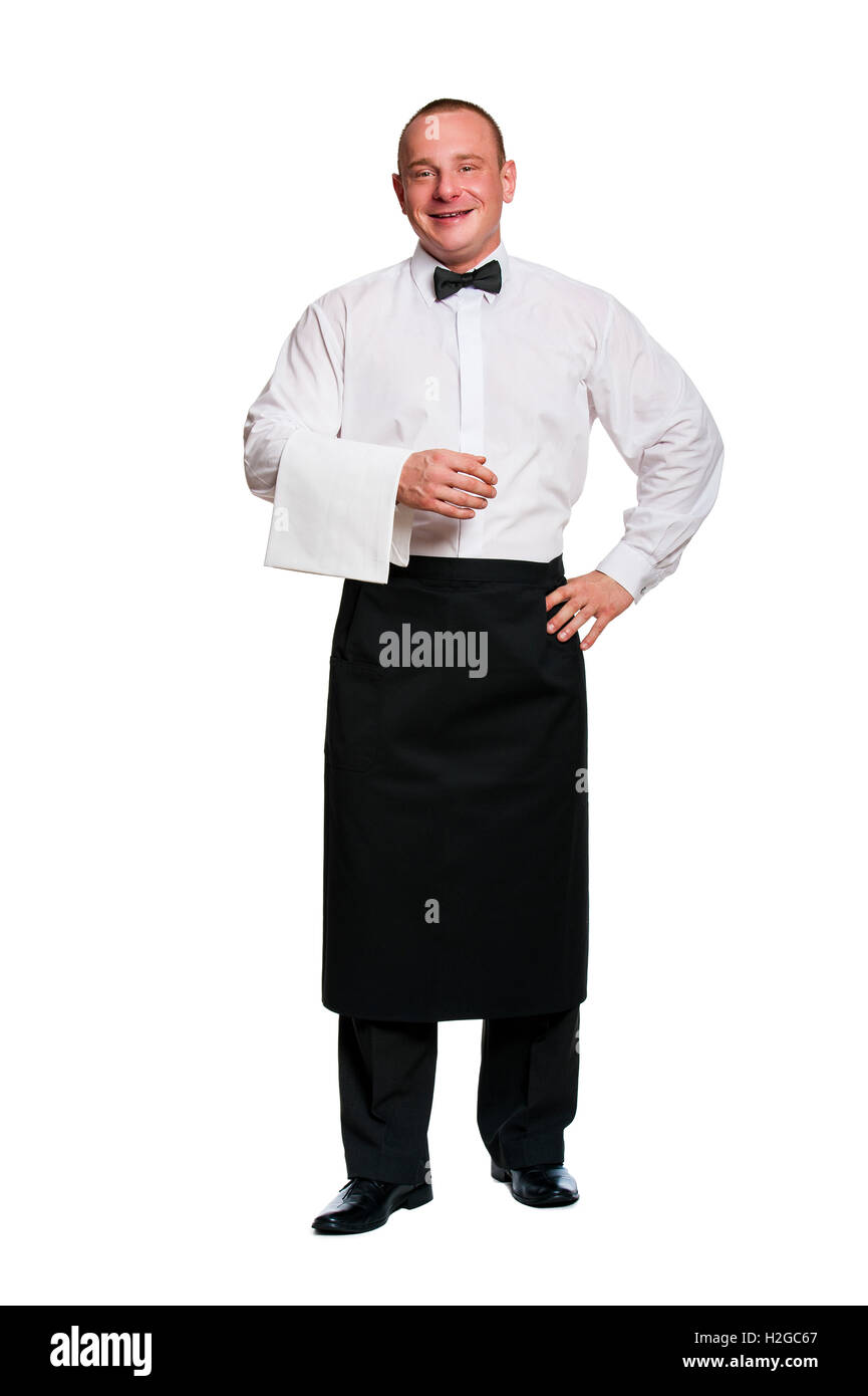 Man waiter standing aprone on isolation background. Smiling Stock Photo ...