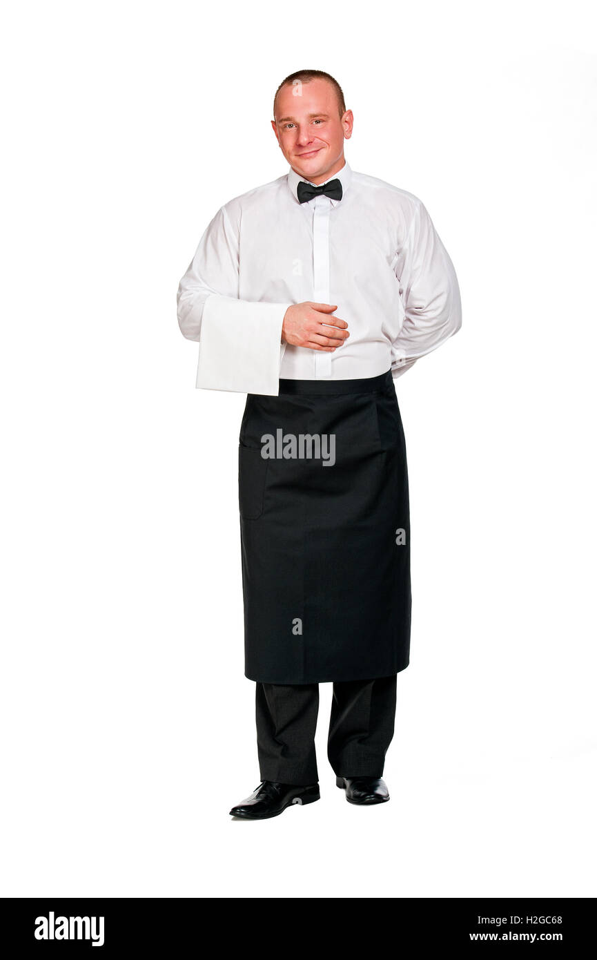 Man waiter standing aprone on isolation background. Smiling Stock Photo ...