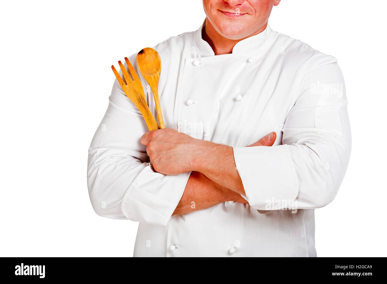 Chef man isolated over white background. Holding spoon and fork Stock ...