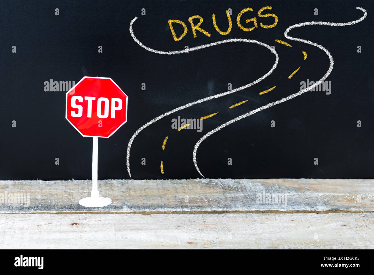 Mini STOP sign on the road to DRUGS, hand drawing over chalkboard Stock ...