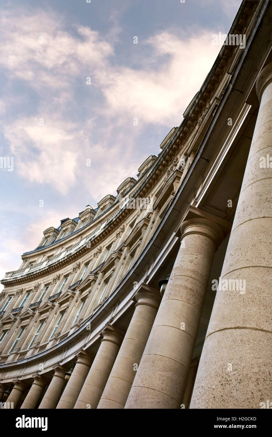 Columns and facade of a stoned building in Paris Stock Photo - Alamy