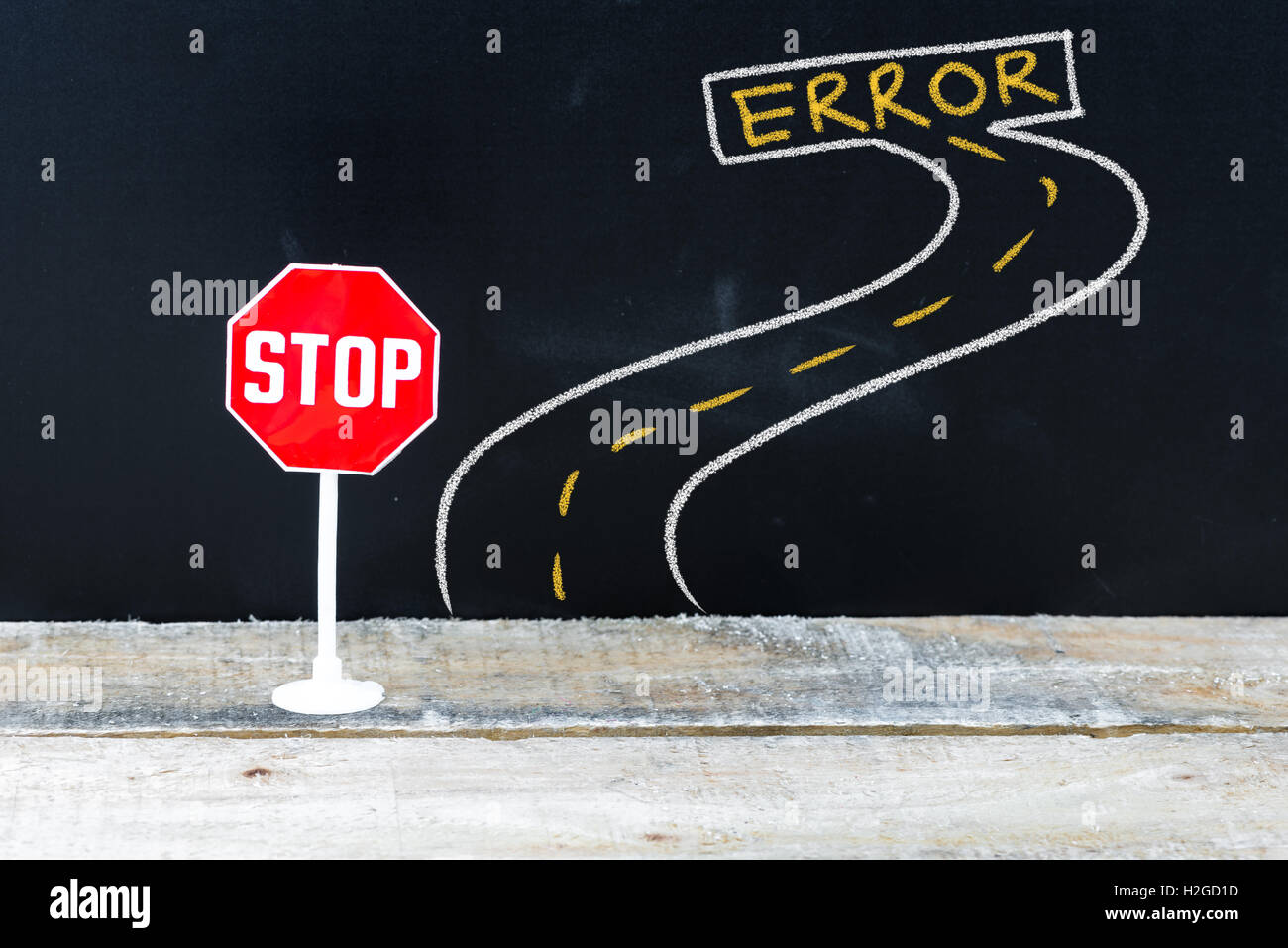 Mini STOP sign on the road to ERROR, hand drawing over chalkboard Stock ...