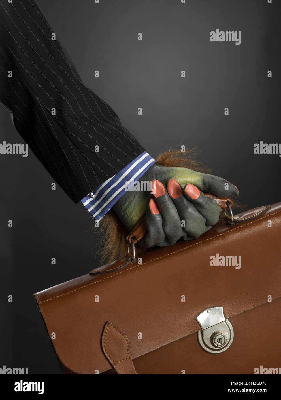 Hand holding briefcase hi-res stock photography and images - Alamy